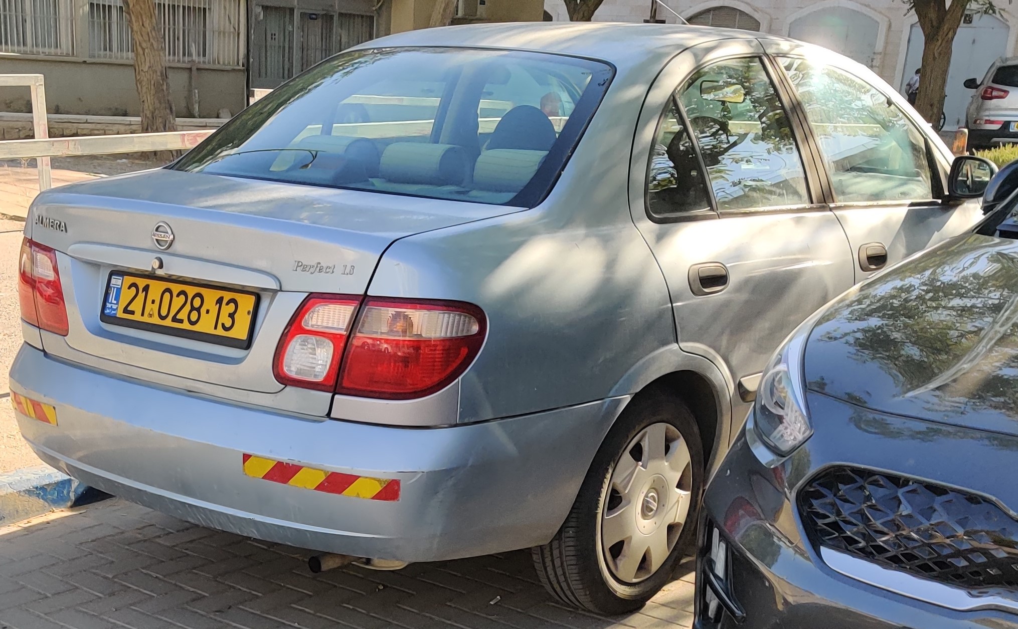 "21-028-13" photos Nissan Almera. Israel