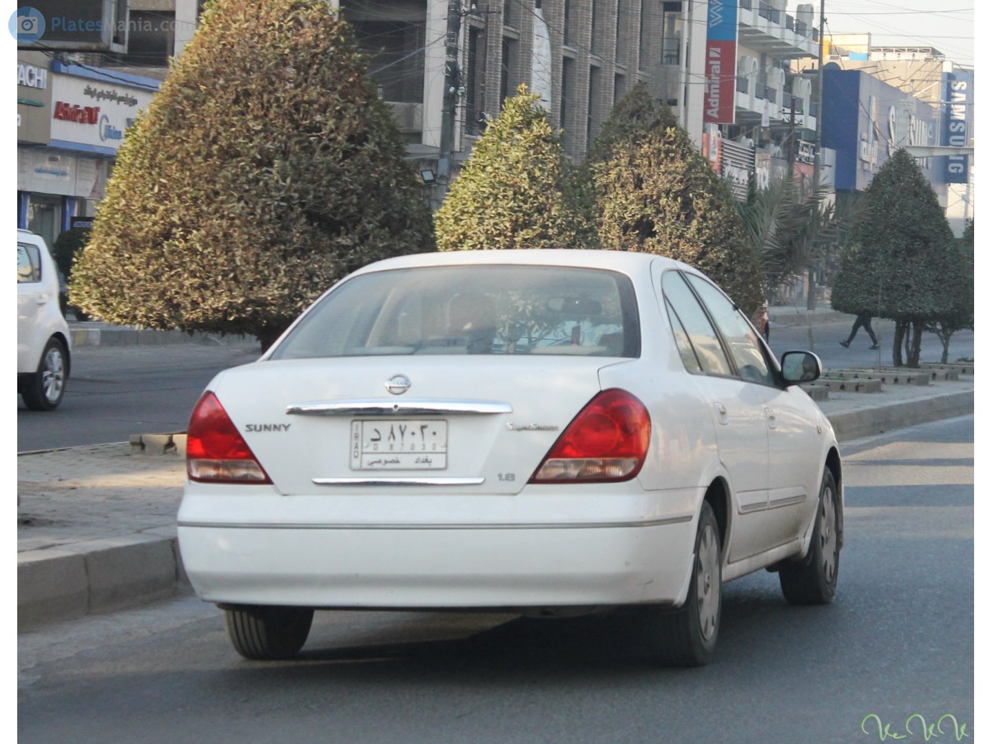 "D 87030" photos Nissan Sunny. Iraq