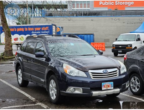 ONE WUG, Subaru Outback (Alaska) License plate of the USA