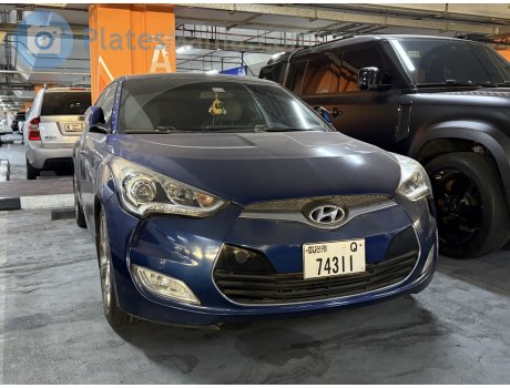 Q 74311, Hyundai Veloster (Dubai) License plate of the UAE