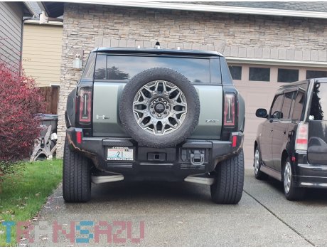 21, GMC Hummer EV (Washington) License plate of the USA
